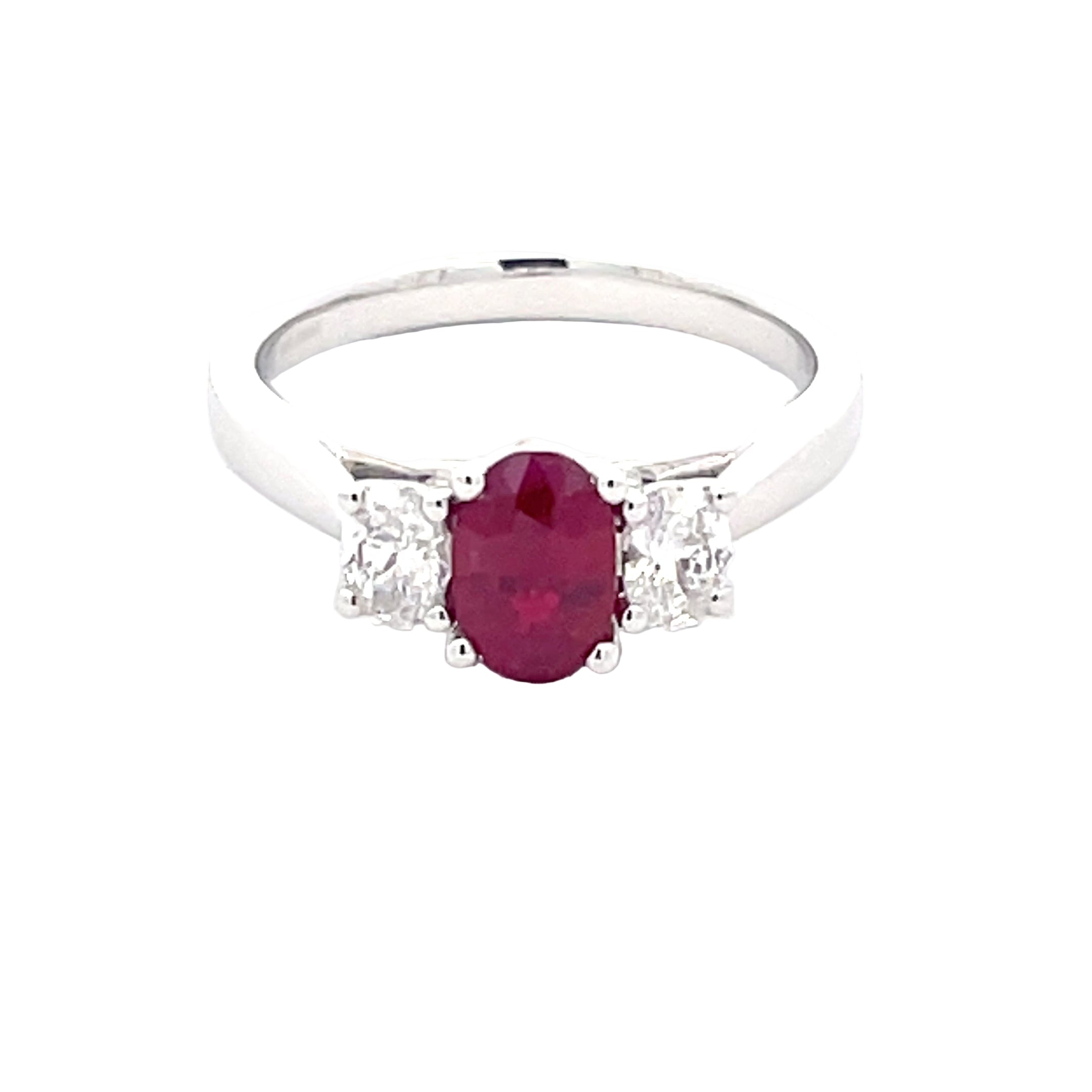 Oval Shaped ruby and round brilliant cut diamond 3 stone ring ...